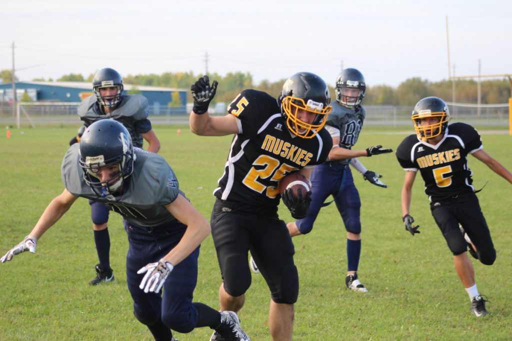 Carrying ball - Fort Frances Times